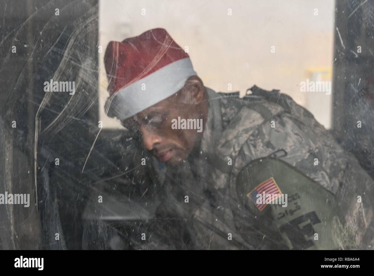 Tech. Sgt. Steven Cherry stands watch at an entry control point at the ...