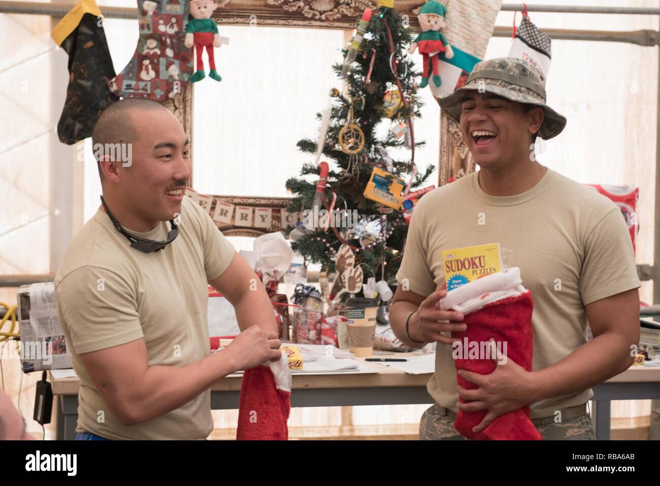Staff Sgt. Daniel Yuk (left) and Airman 1st Class Justin Parra, both ...