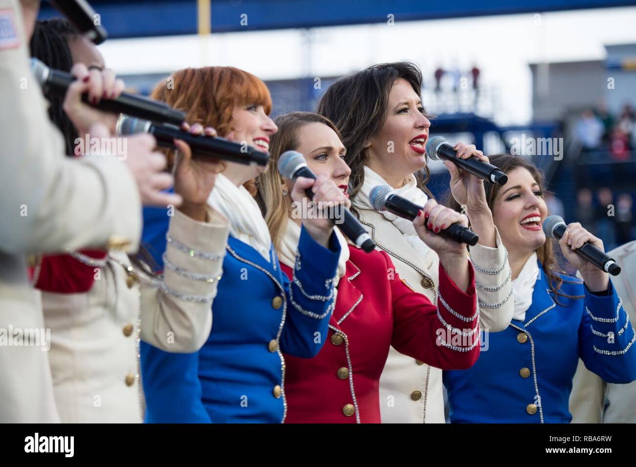 Members of the USO Show Troupe performs before the 2016 Military Bowl ...
