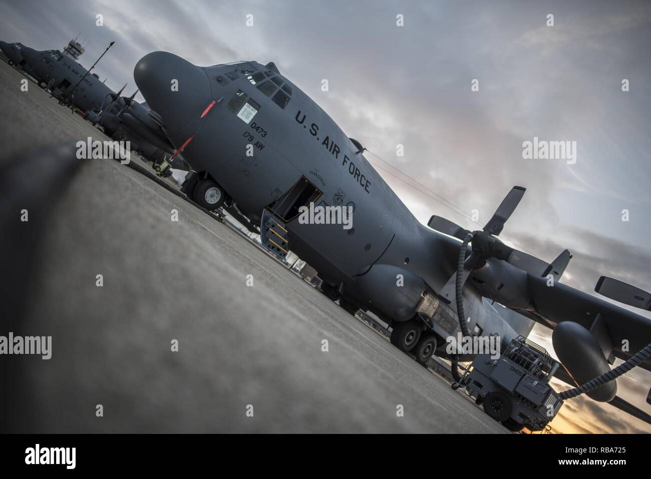 Members of the 179th Maintenance Group perform routine morning ...