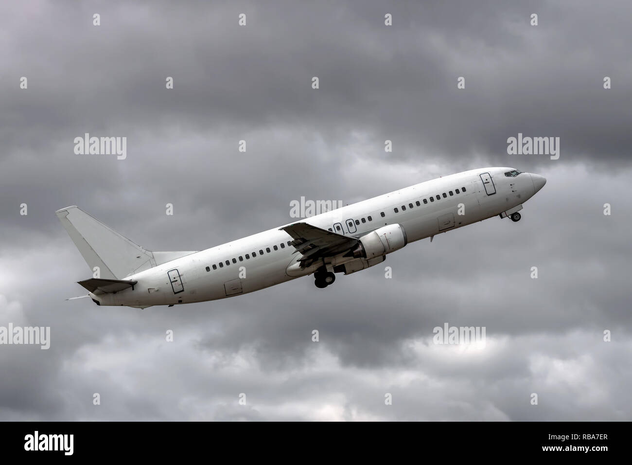 Passenger plane is taking off into storm in bad weather conditions ...