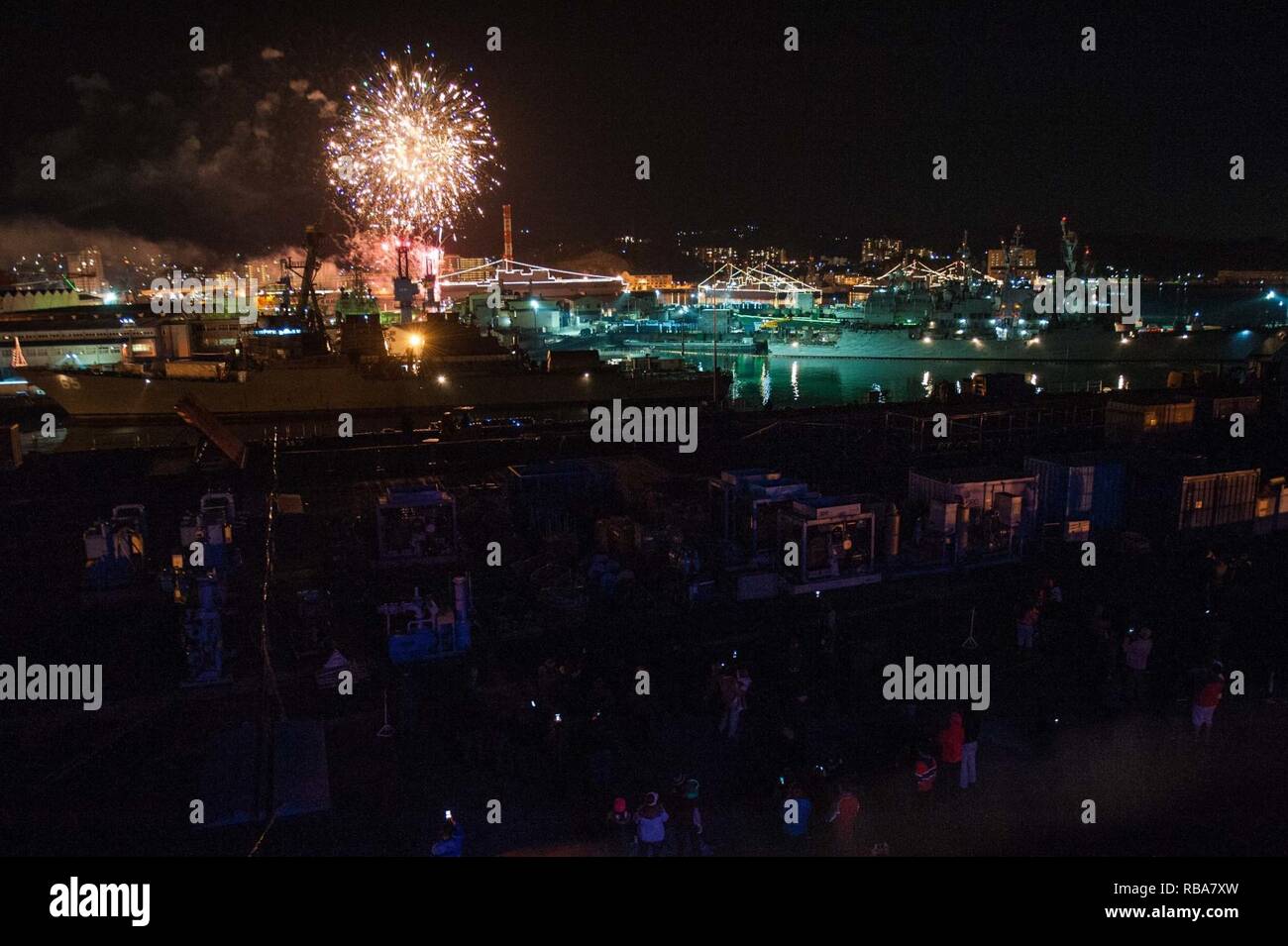 YOKOSUKA, Japan (Jan. 1, 2017) Sailors and guests watch New Year’s Day ...