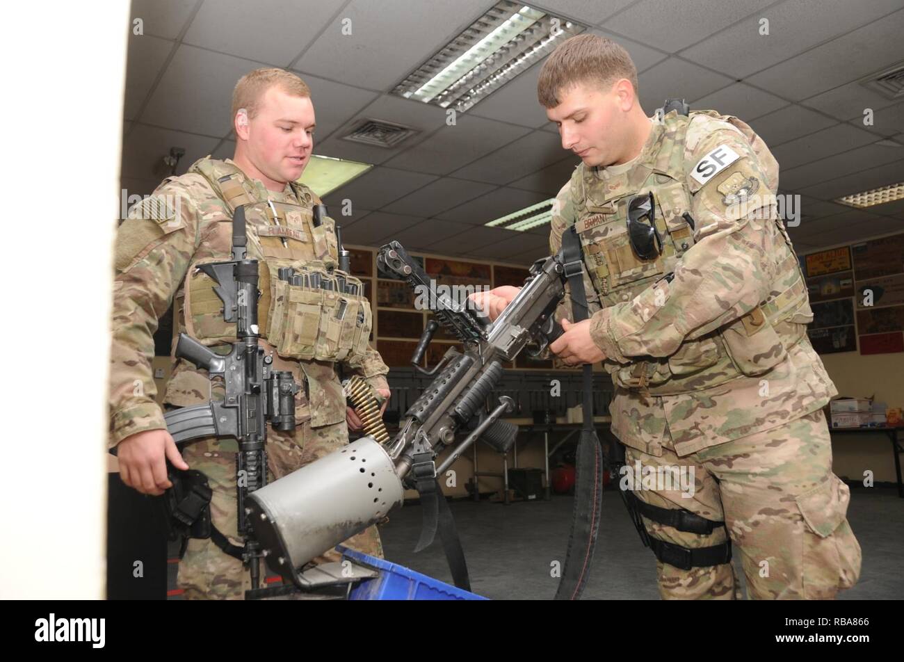 Senior Airman Rhea Flambeau, left, and Senior Airman Grayson Bryant ...