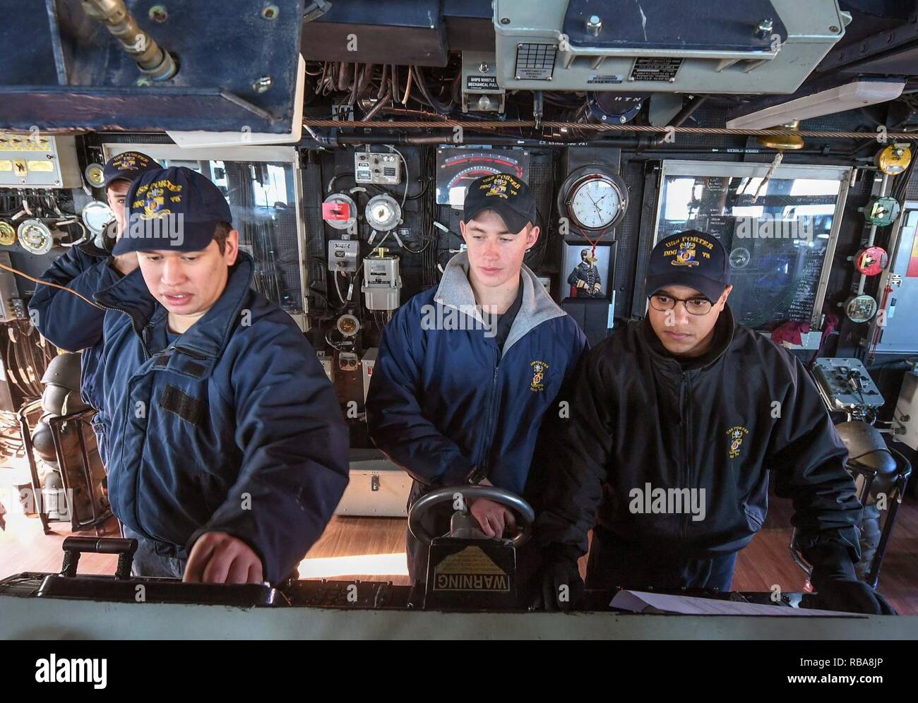 VENICE, Italy (Jan. 3, 2017) Sailors man the helm aboard the guided ...