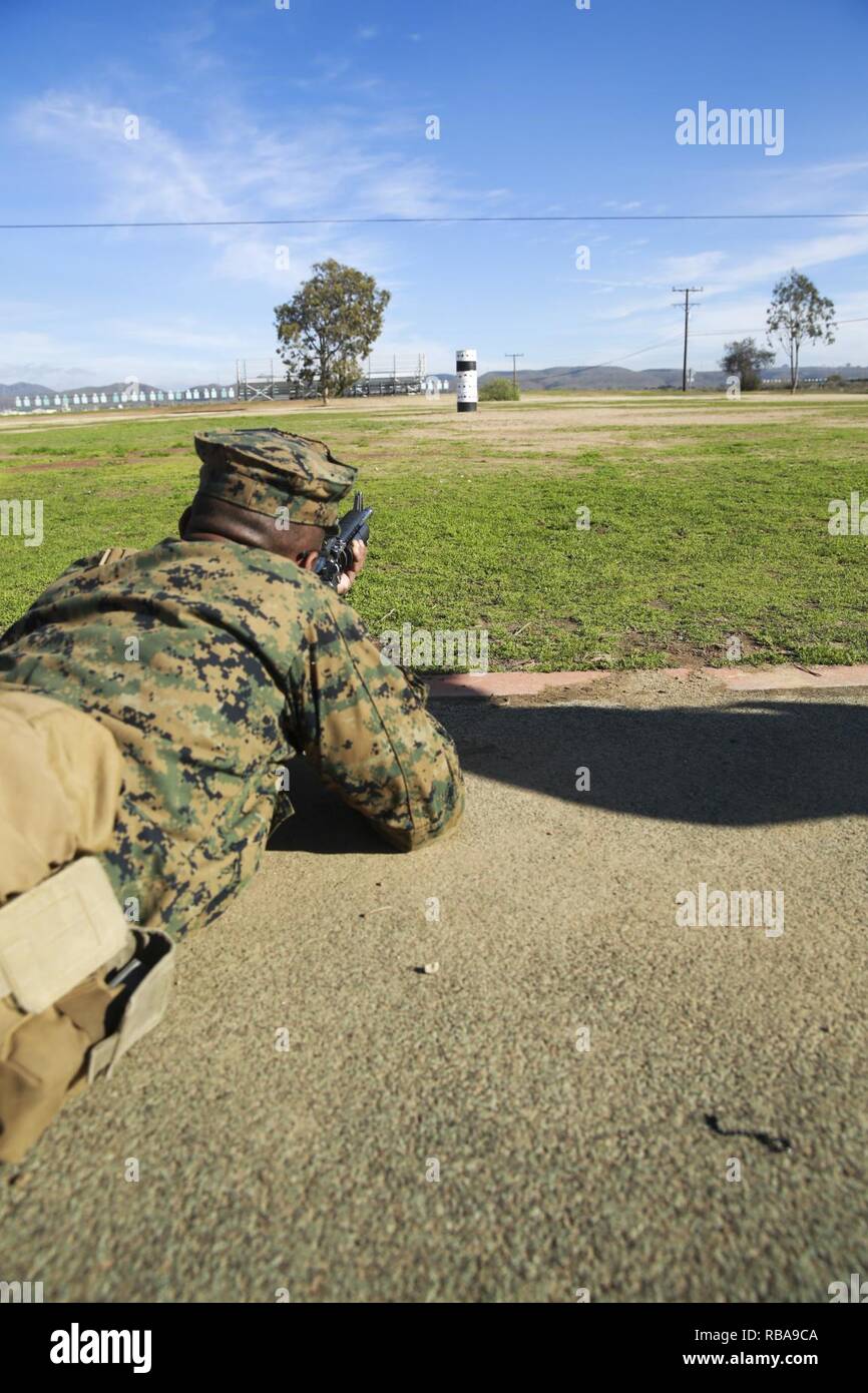 A recruit from India Company, 3rd Recruit Training Battalion, aims at a ...