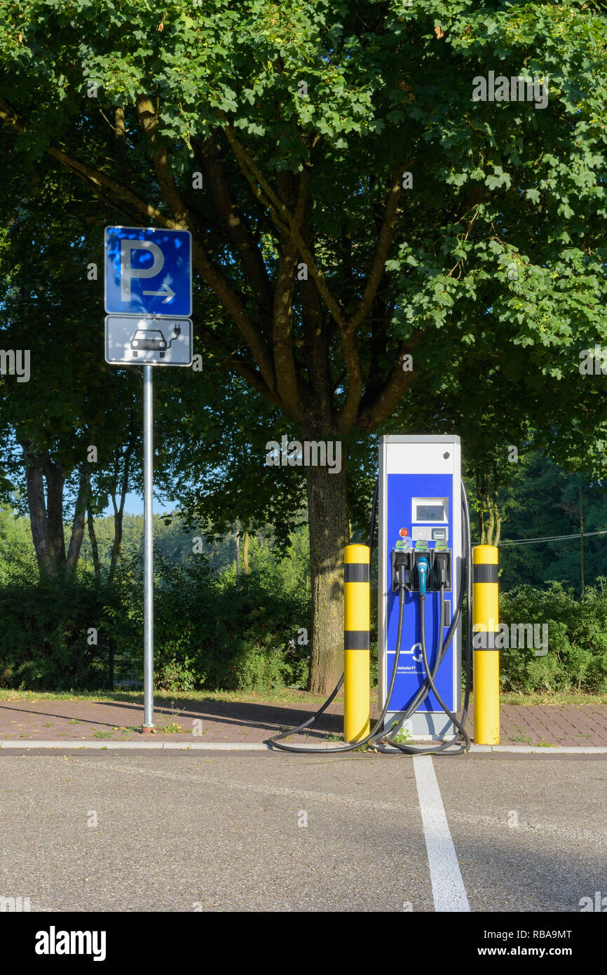 Car power charging station on highway resting place, Autobahnraststätte ...
