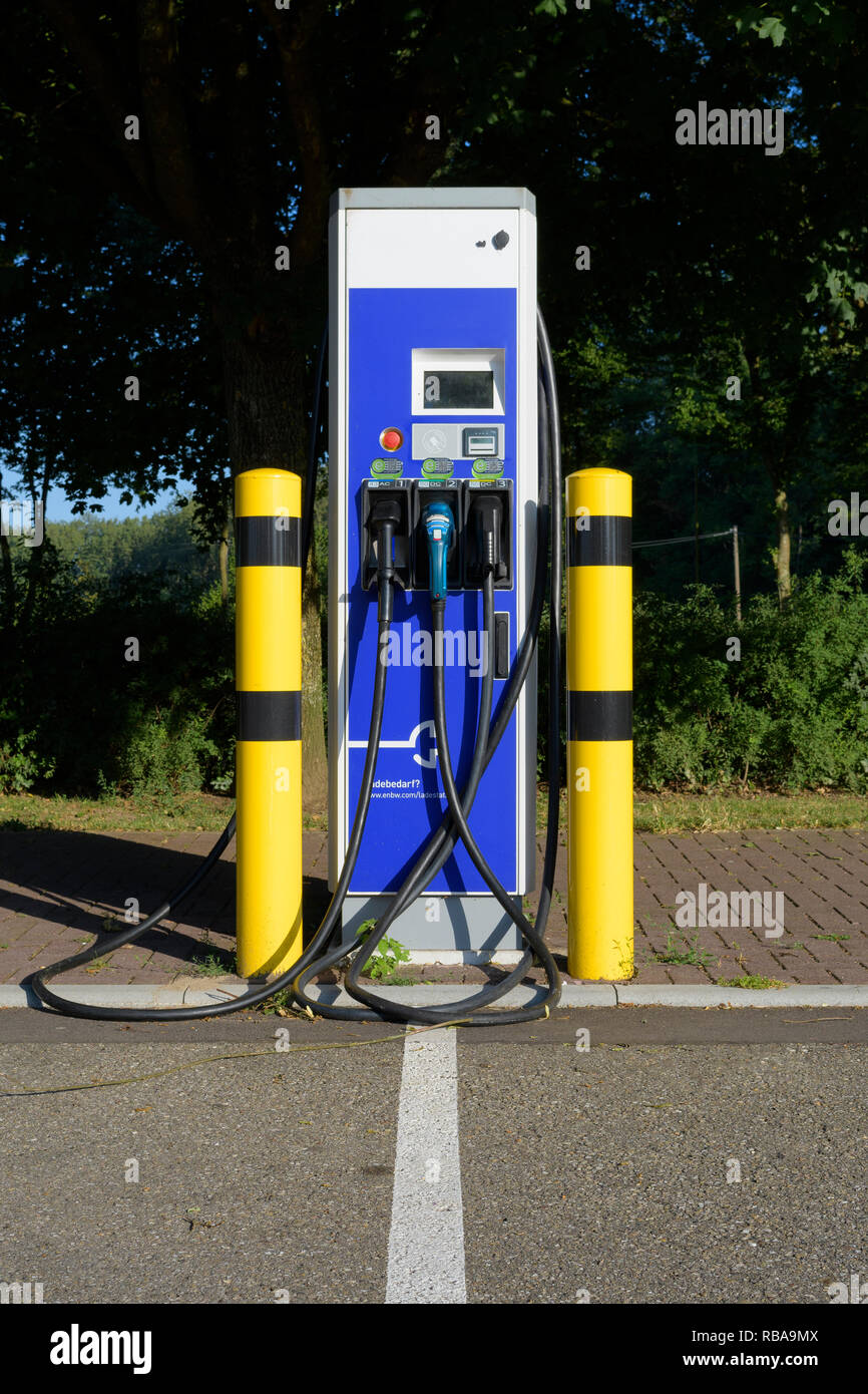 Car power charging station on highway resting place, Autobahnraststätte ...