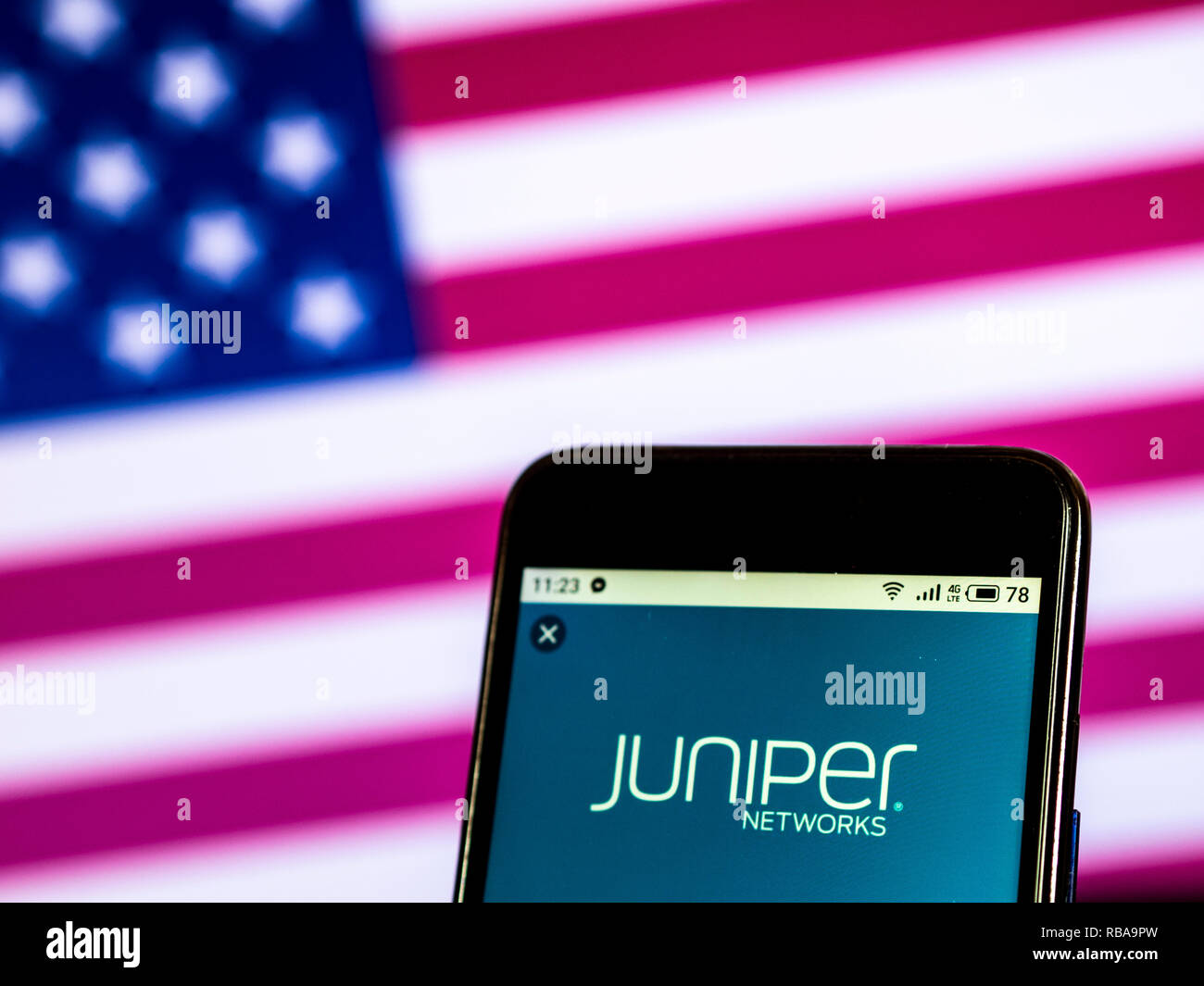 Juniper Networks Software developer logo seen displayed on smart phone ...