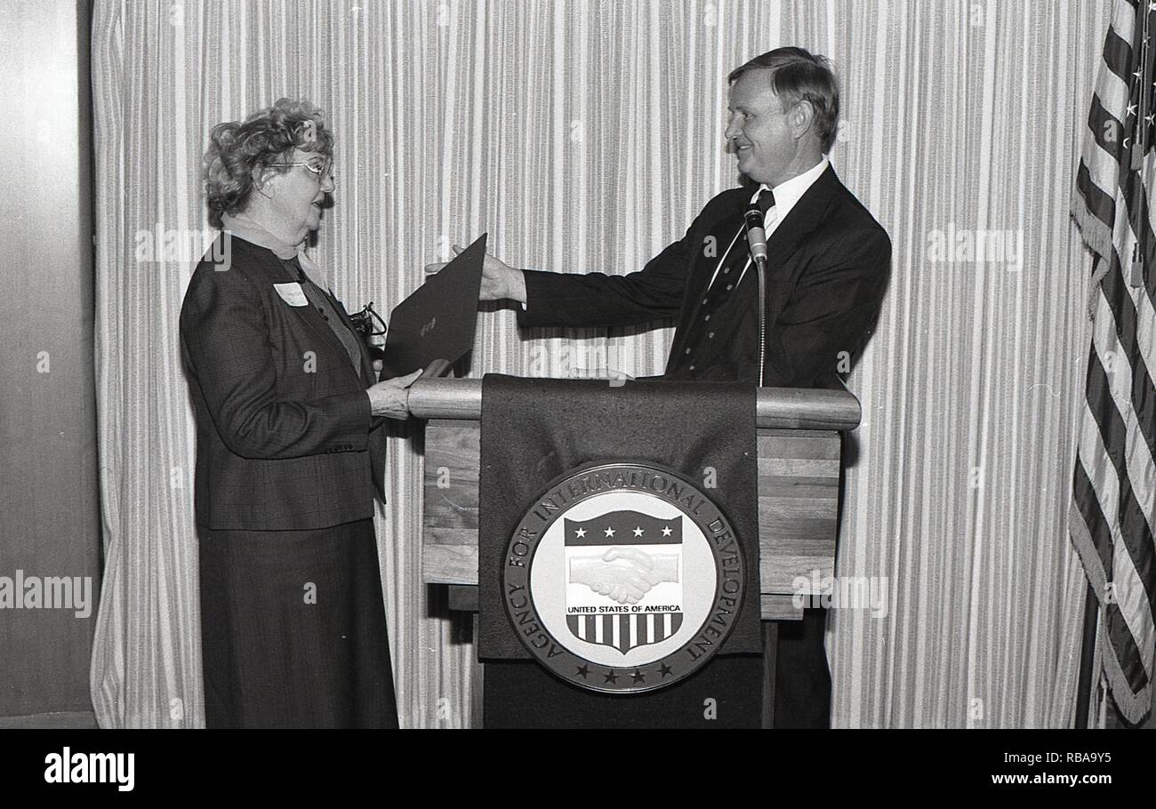 WOMAN RECEIVING AN AWARD Stock Photo - Alamy