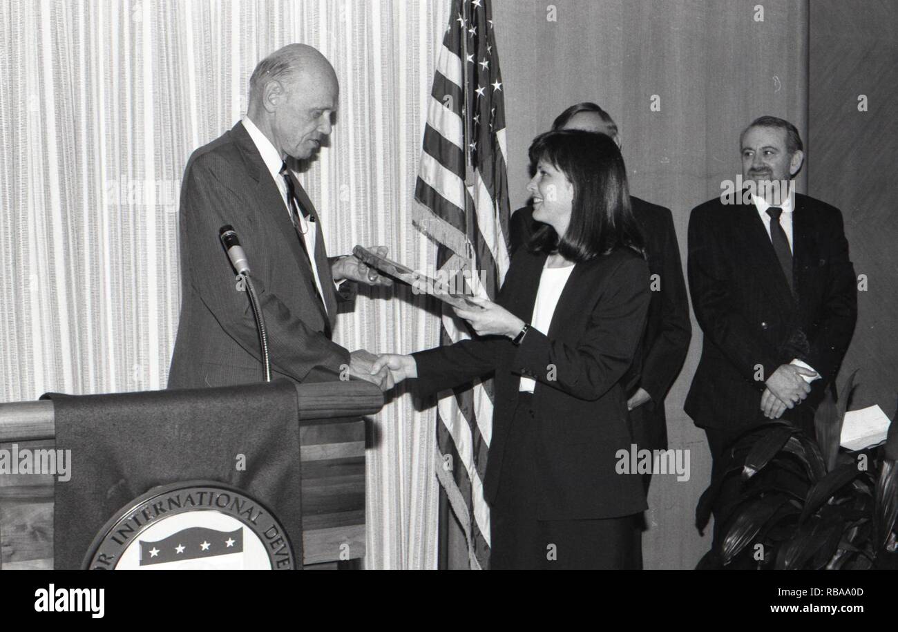 WOMAN RECEIVING AN AWARD Stock Photo - Alamy