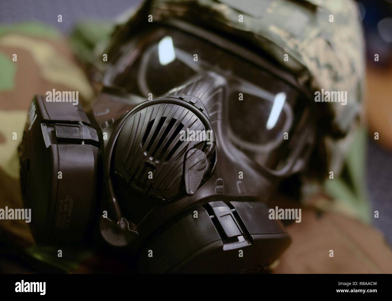 A chemical, biological, radiological, and nuclear defense face mask is ...
