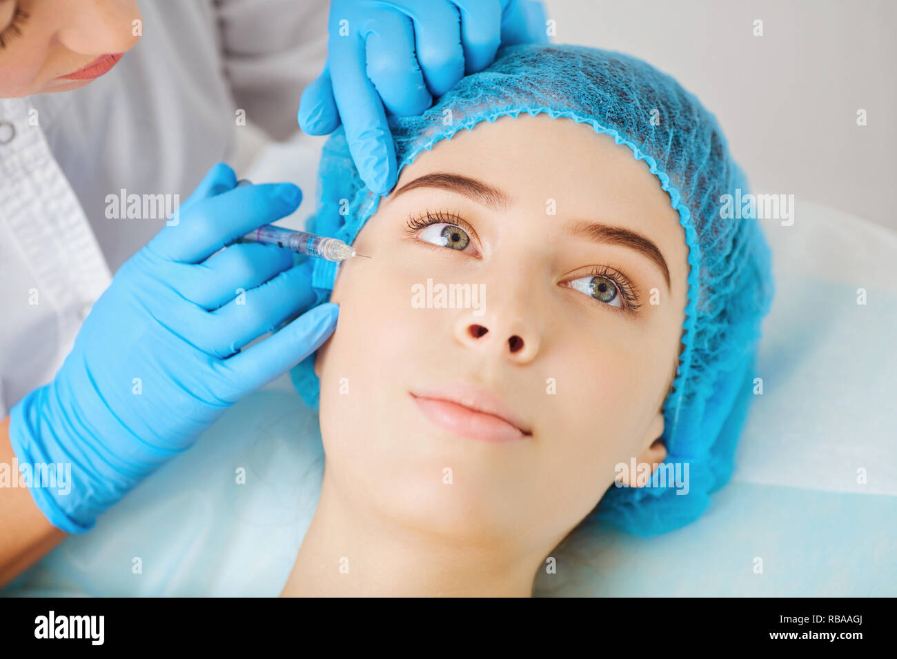 Beauty injection in face for women Stock Photo - Alamy