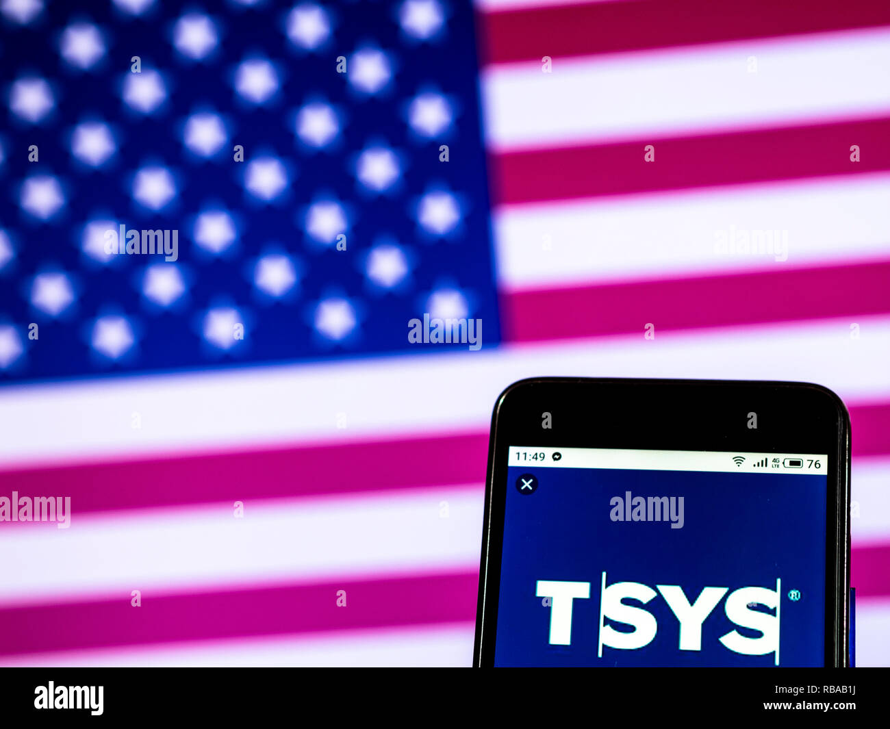 TSYS Credit card service company logo seen displayed on smart phone ...