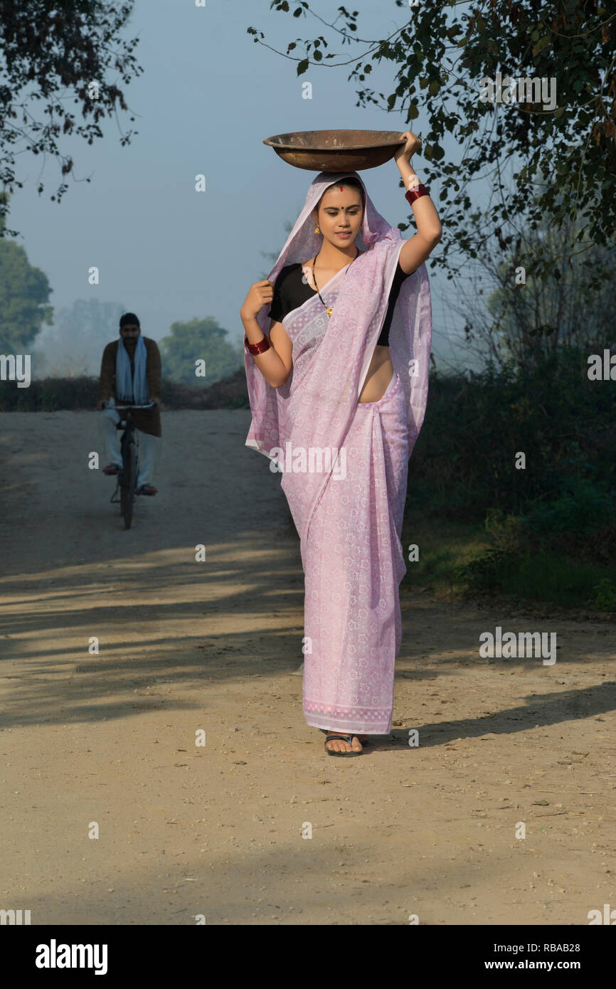 Indian man woman on bicycle hi-res stock photography and images - Alamy