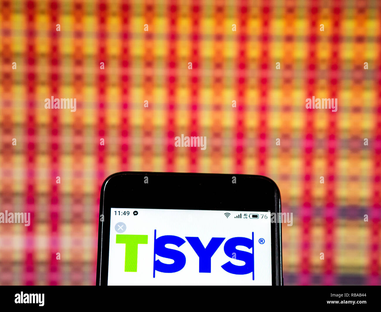 TSYS Credit card service company logo seen displayed on smart phone ...