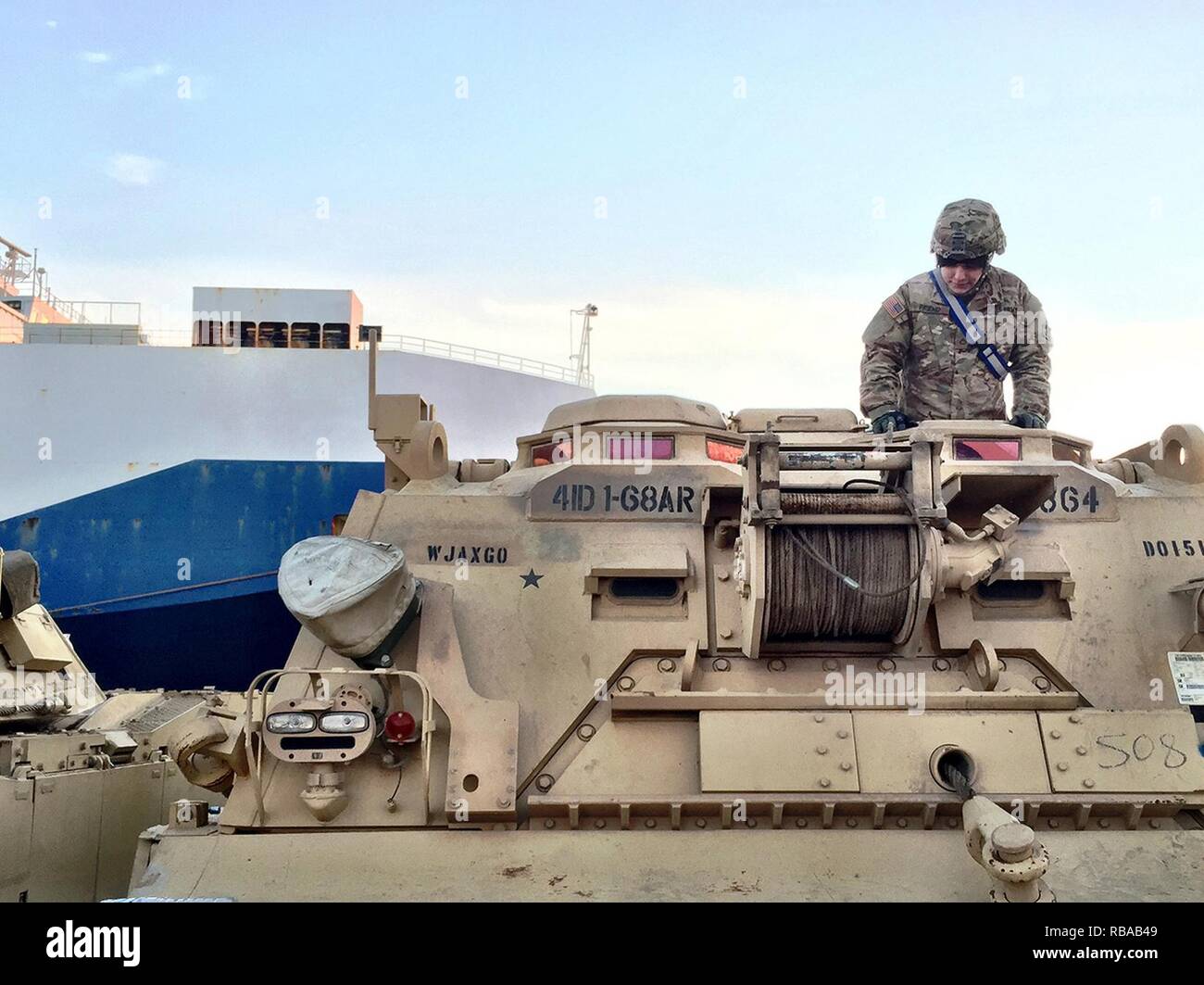 BREMERHAVEN, Germany – Pfc. Traven Friend, a tank mechanic with Forward ...
