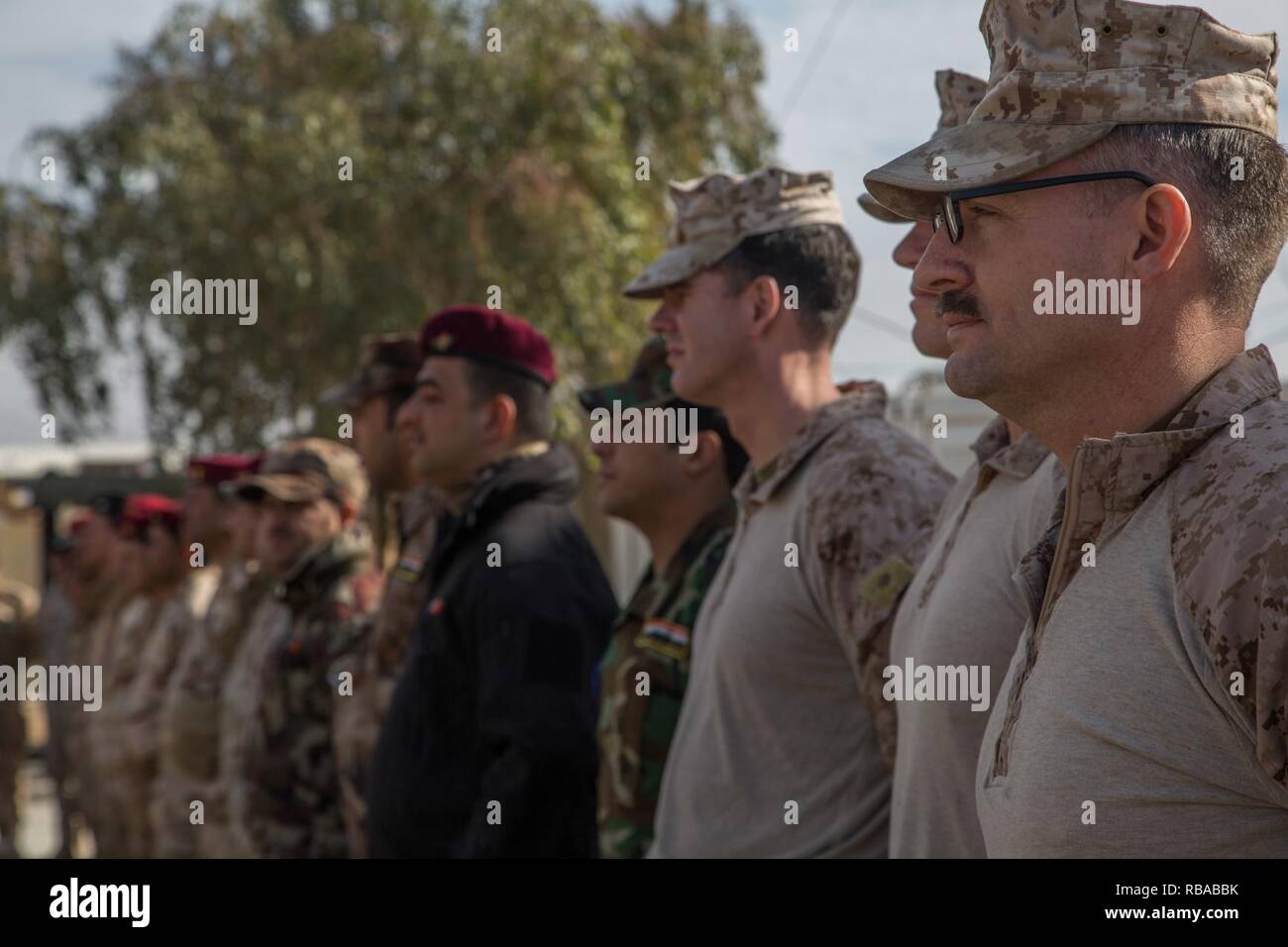 U.S. Marines and Iraqi security forces take part in an Iraqi Army ...