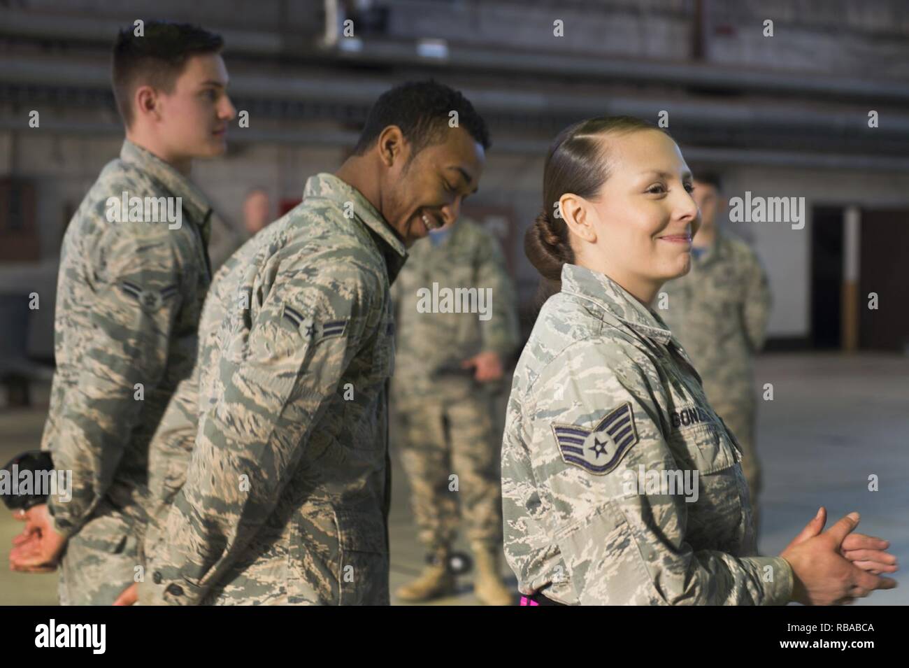 U.S. Air Force Staff Sgt. Sarah Gonzales, Airmen 1st Class Licinio ...