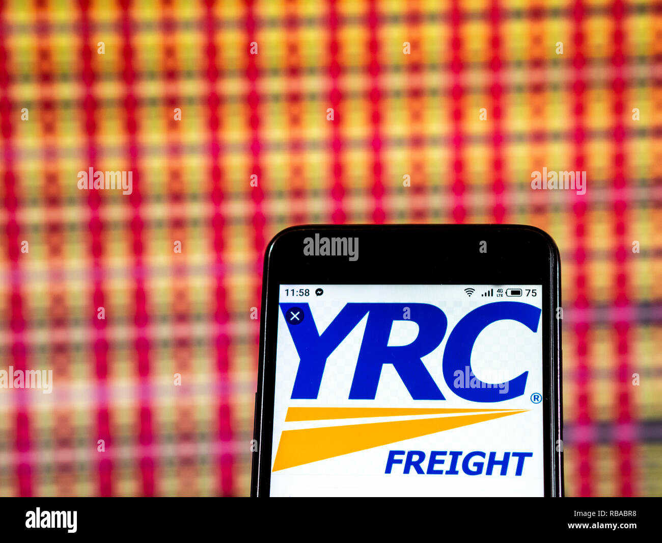 YRC Worldwide Holding company logo seen displayed on smart phone Stock ...