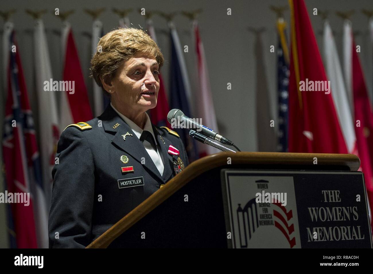 Chief Warrant Officer 5 Mary Alice Hostetler gives her remarks during ...