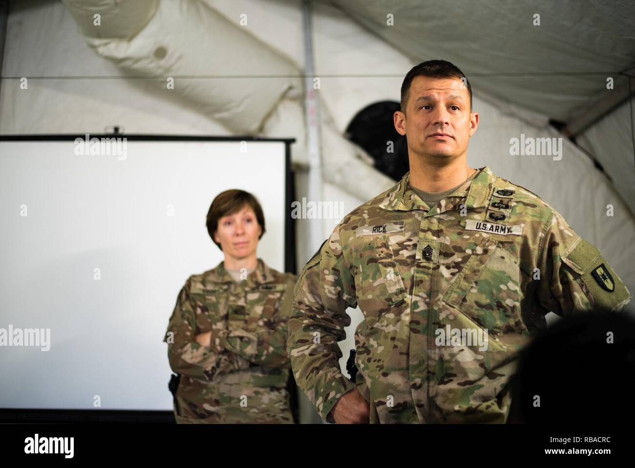 U.S. Army Command Sgt. Maj. Kristopher Rick, right, 44th Medical ...