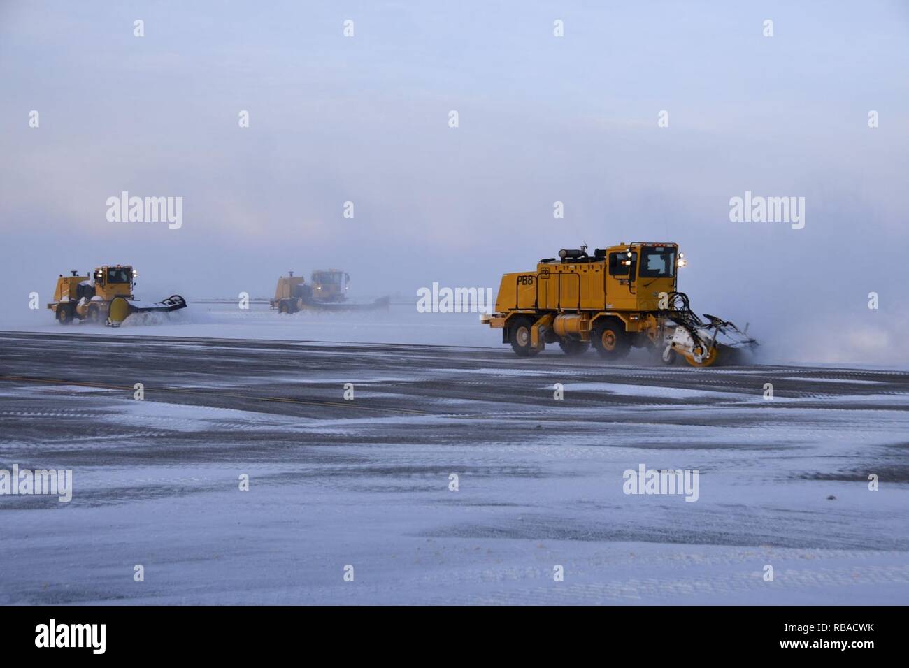 State of Montana Department of Military Affairs employees use plows and ...
