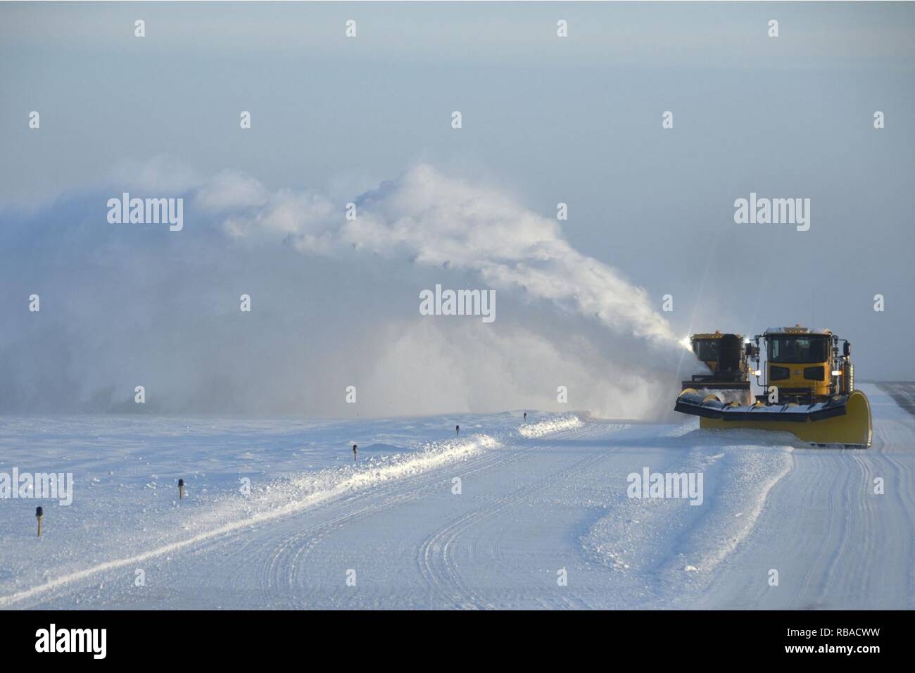 State of Montana Department of Military Affairs employees use plows and ...