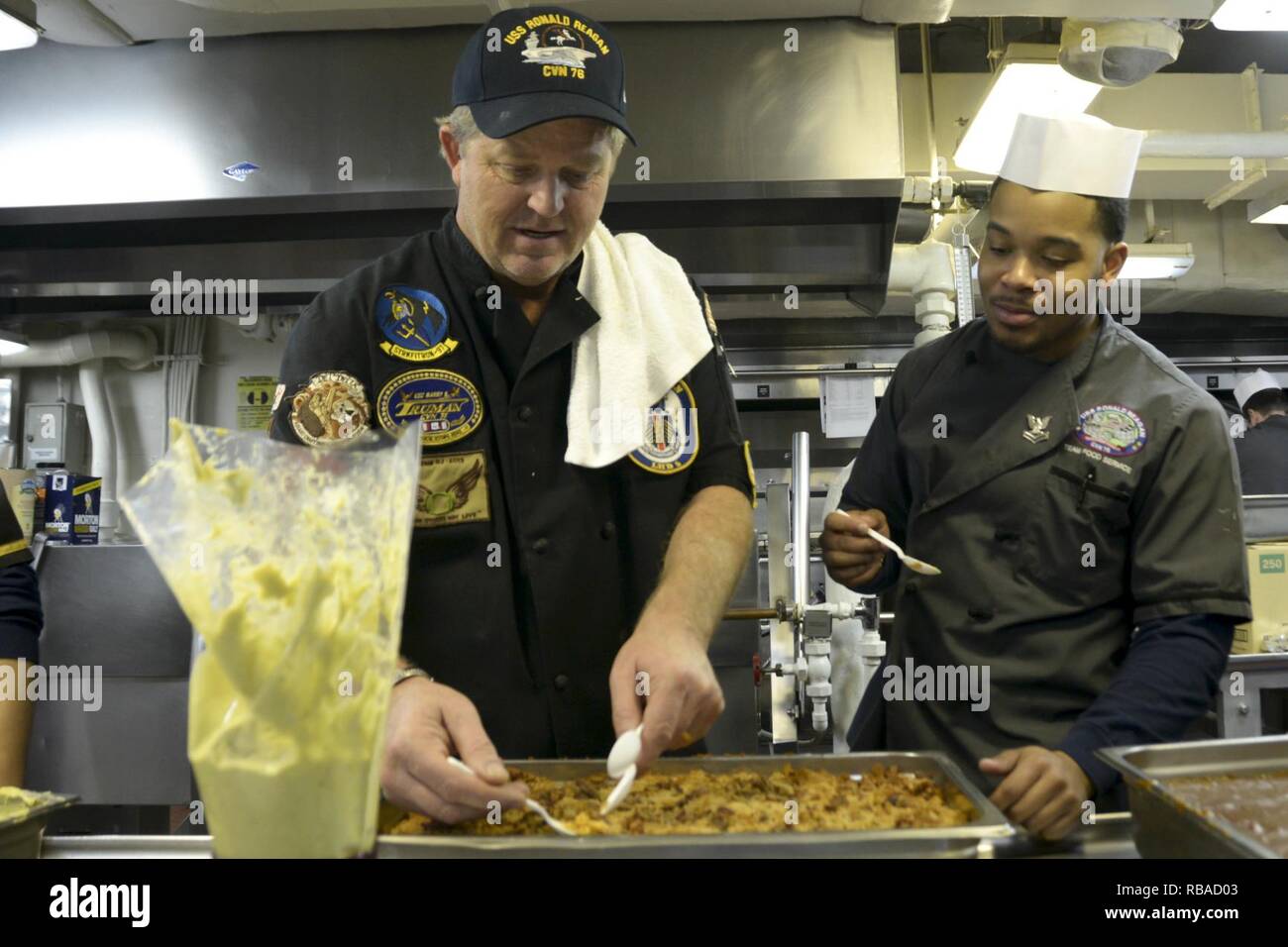 Culinary Specialist 2nd Class (SW/AW/IW) Ronald Rhodes, right, from ...