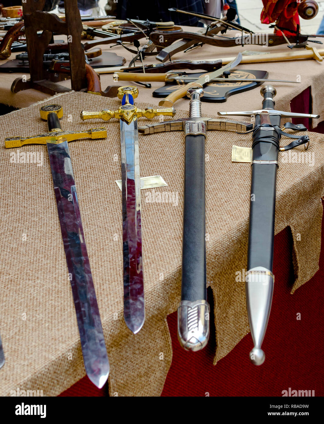 medieval fair with market and knights reenactment toy swords for sale ...