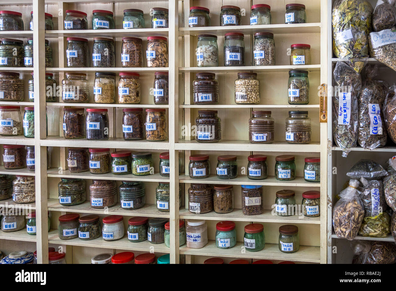 Chinese Medicine store with jars of herbal drugs and medications Stock ...