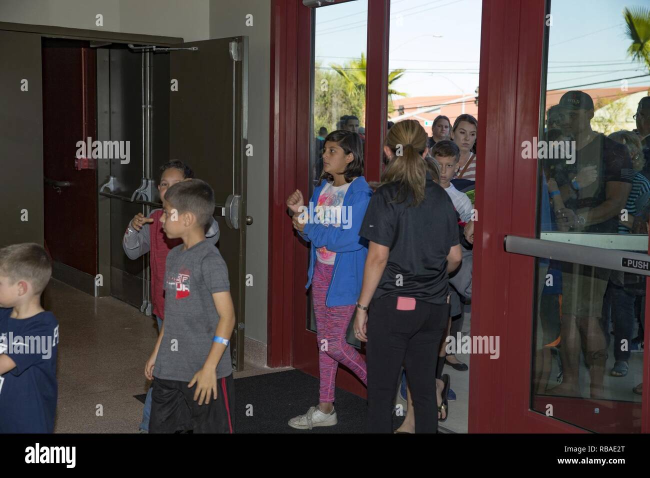 U.S. service members, employees and their families attend the grand ...