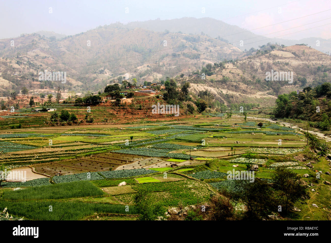 Mountain landscape and terraced farming in the lower Himalayas in Nepal ...