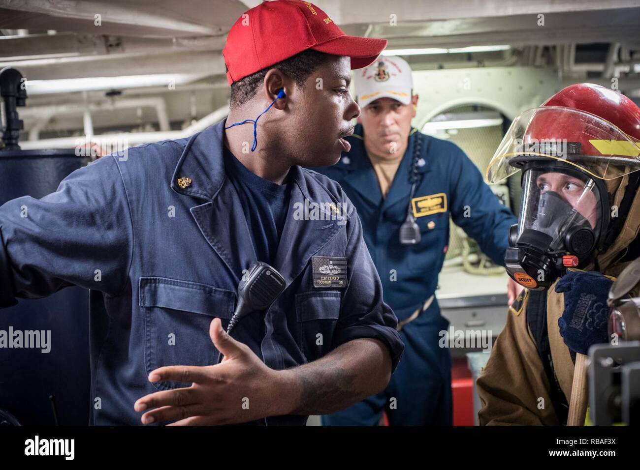 ATLANTIC OCEAN (Dec. 17, 2018) Chief Fire Controlman Curtis Earle, left ...