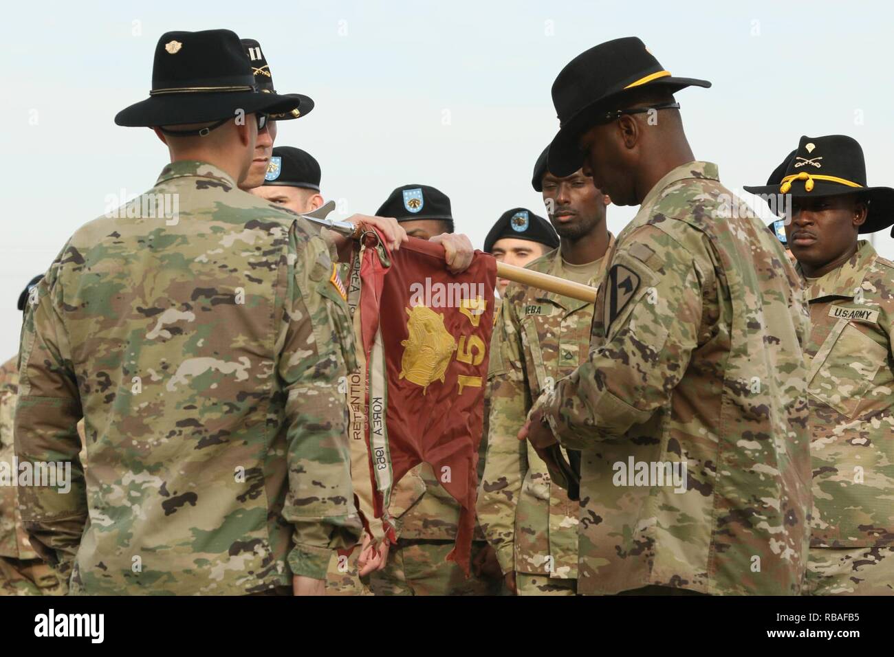Capt. Nathaniel McDermott (L), commander, and 1st Sgt. Anthony Hill (R ...