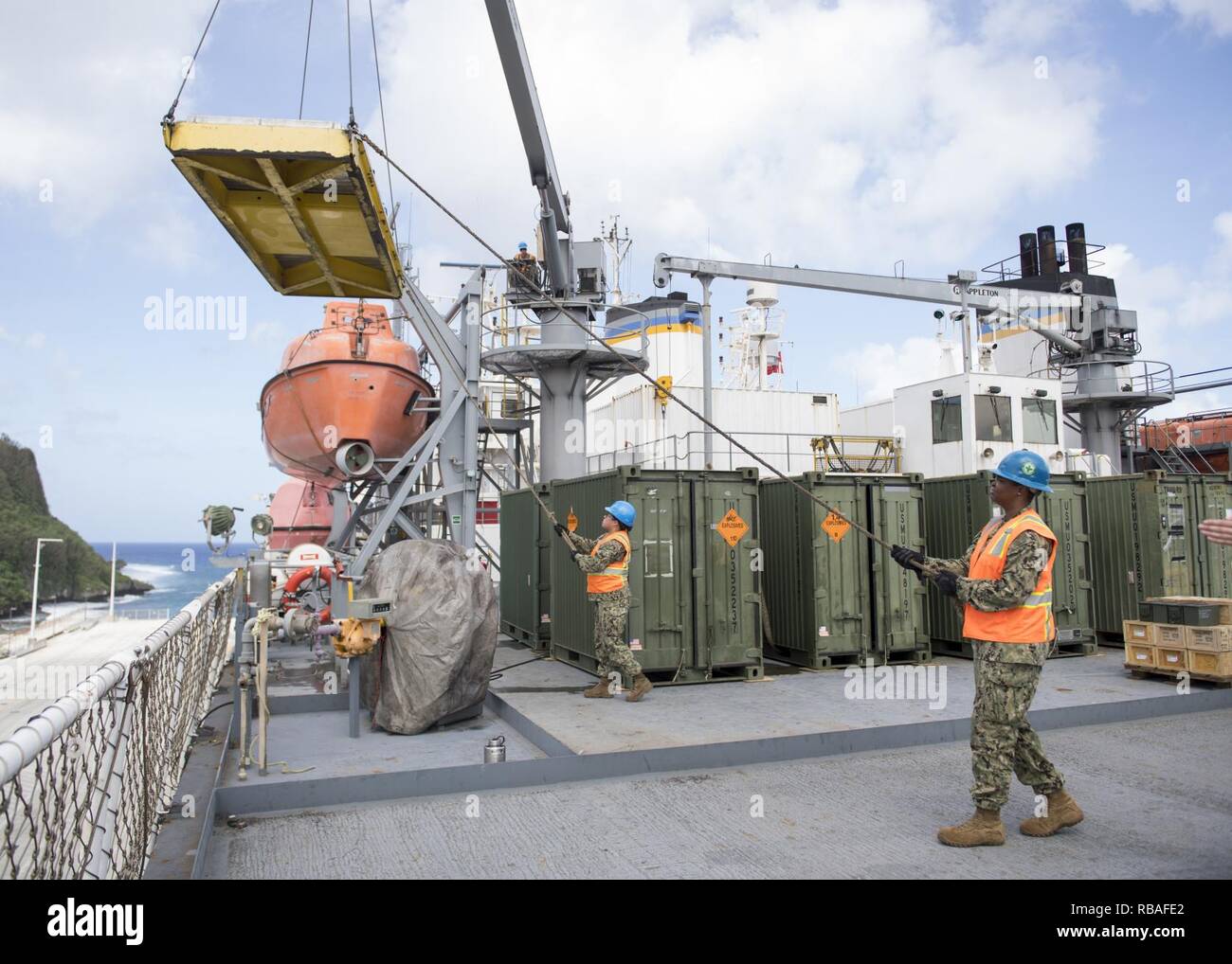 SANTA RITA, Guam (Dec. 18, 2018) Sailors assigned to Navy Cargo ...