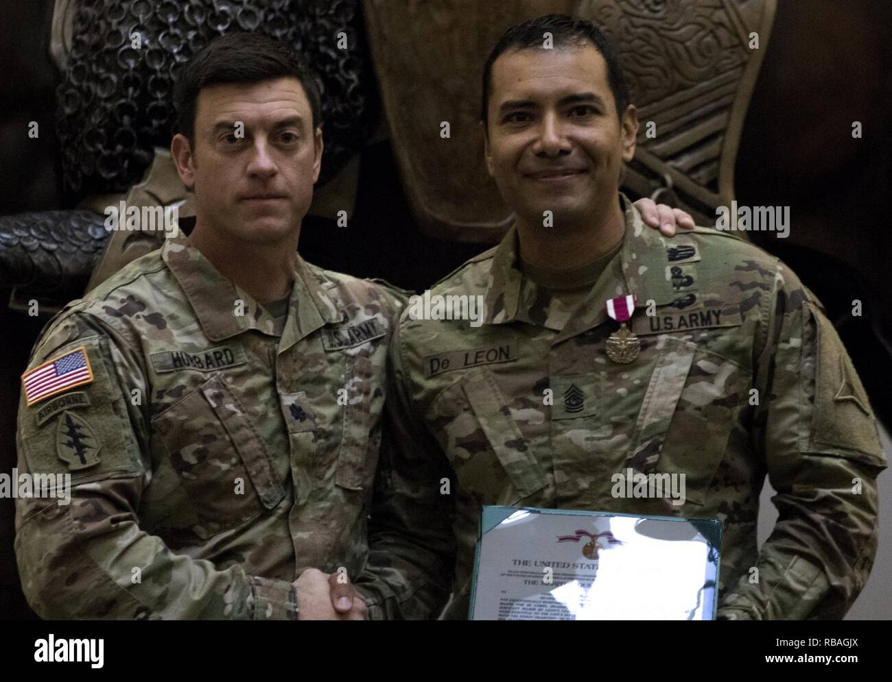 Lt. Col. Sean Hubbard (Left) poses with Command Sgt. Maj. Louis De Leon ...