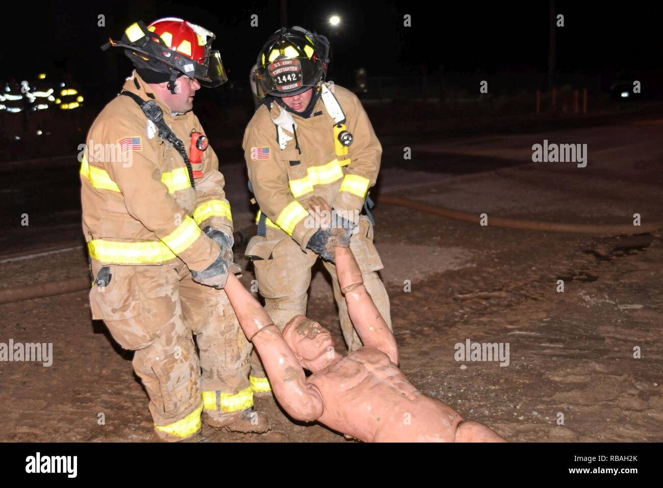 Firefighter Rescue Carry Stock Photos & Firefighter Rescue Carry Stock ...