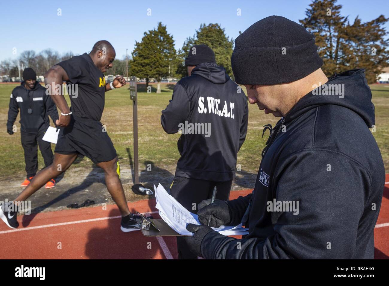 U.S. Army Staff Sgt. Victor M. Lopez, right, an instructor with the New ...