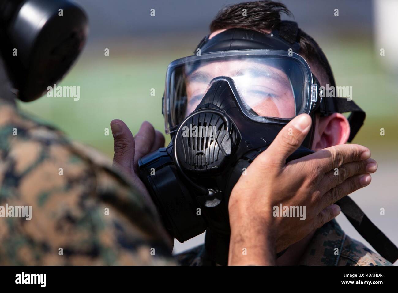 A U.S. Marine with III Marine Expeditionary Force Information Group ...