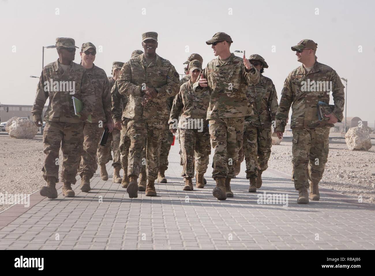 Chief Master Sgt. of the Air Force Kaleth O. Wright (center left) tours ...