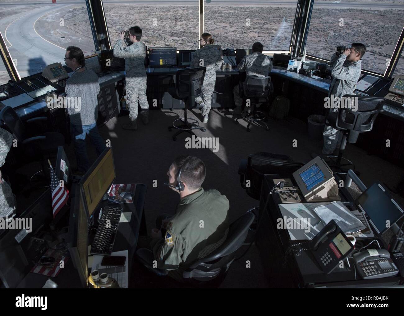 54th Operations Support Squadron air traffic controllers observe F-16 ...