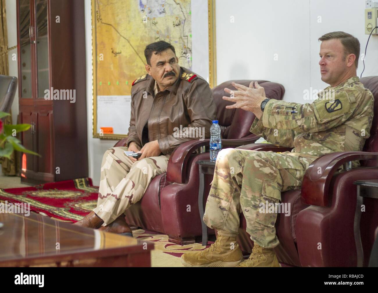 U.S. Army Lt. Col. Glenn Adams, right, commander of Task Force India ...