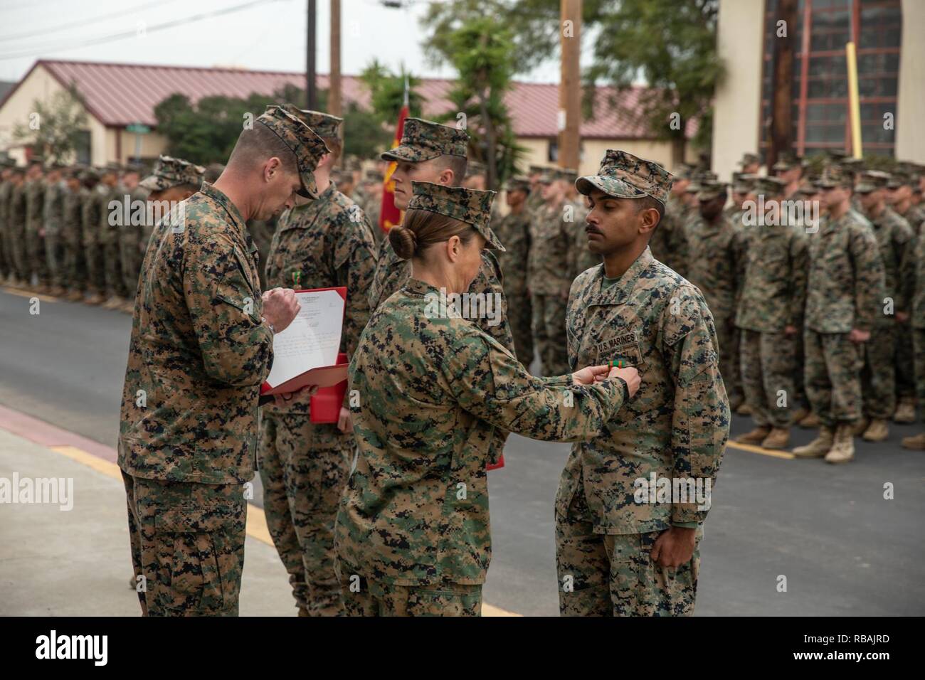 U.S. Marine Corps Cpl. Mark E. Dass, an engineer equipment operator ...