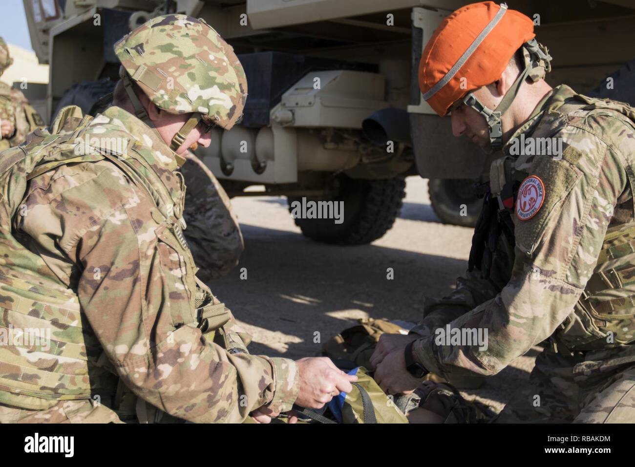 U.S. Army combat medics Sgt. Derrick H. Burnham, 335th Signal Command ...