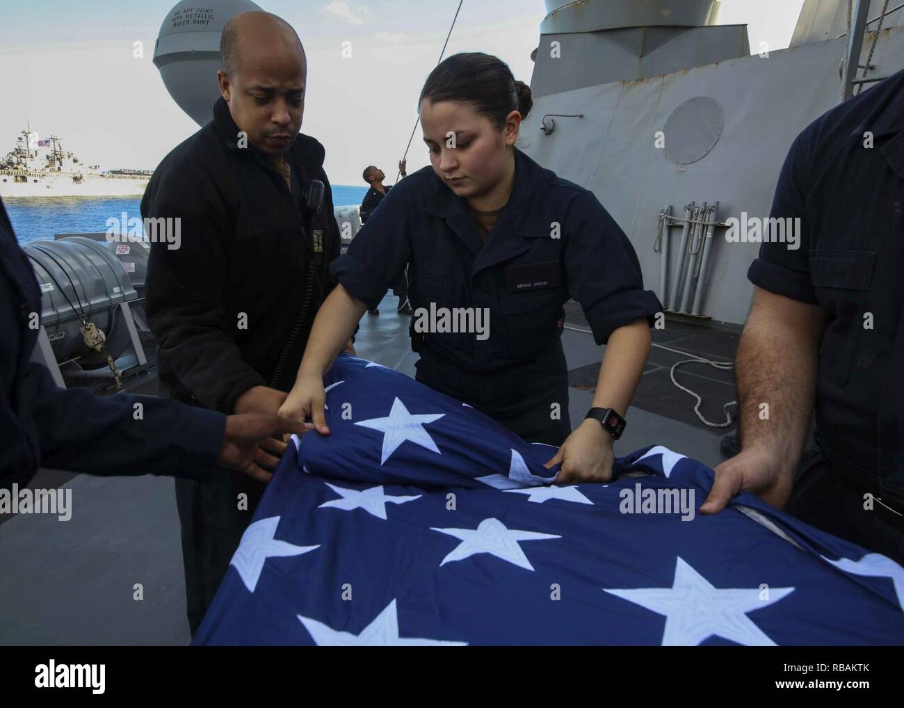 ATLANTIC OCEAN (Dec. 24, 2018) Lt. j.g. Jeremy Goods, left, and ...