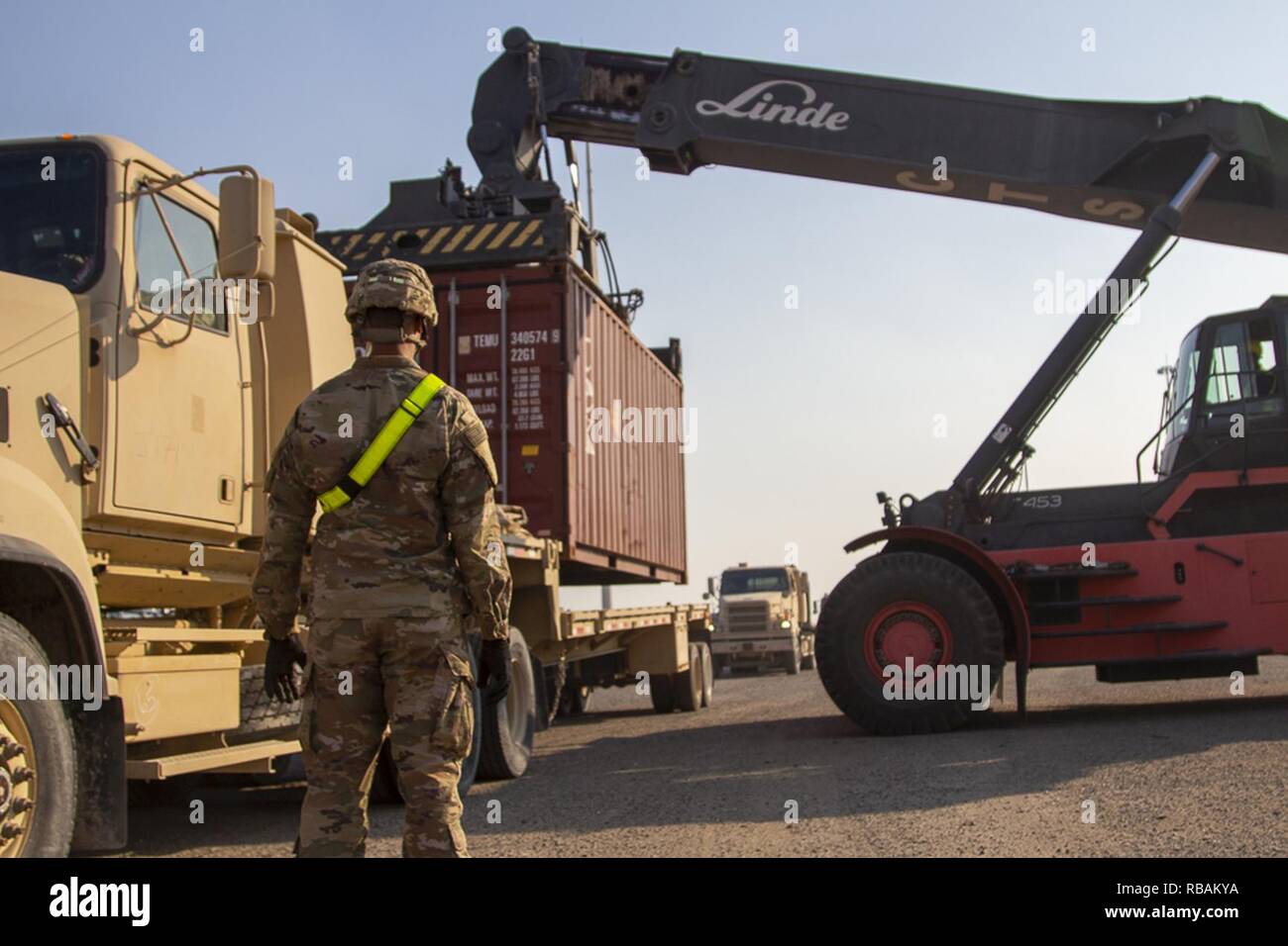 A Soldier from the 420th Movement Control Battalion observes a ...