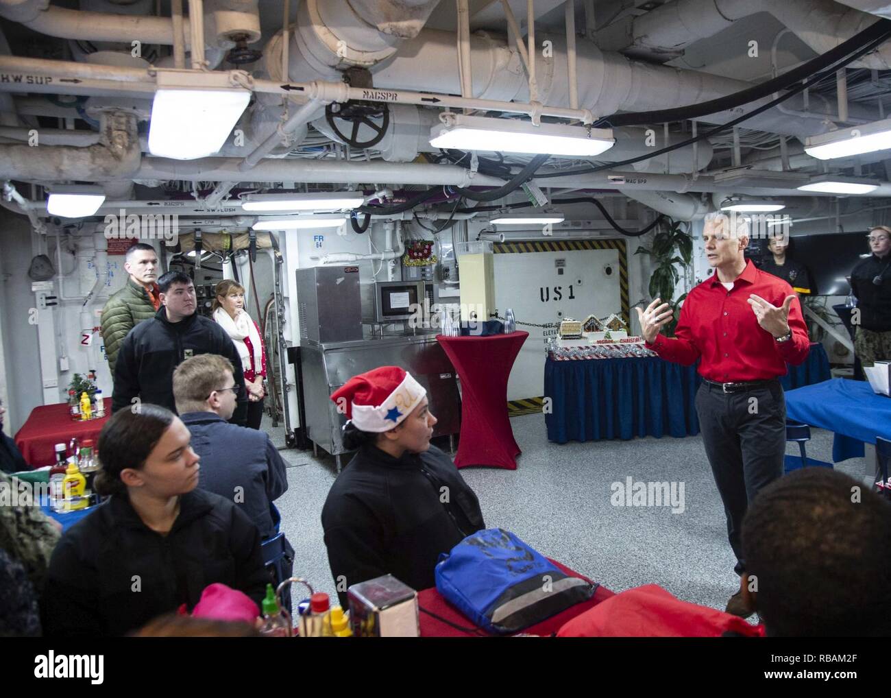 NORFOLK, Va. (Dec. 25, 2018) Capt. Kyle Higgins, right, commanding ...