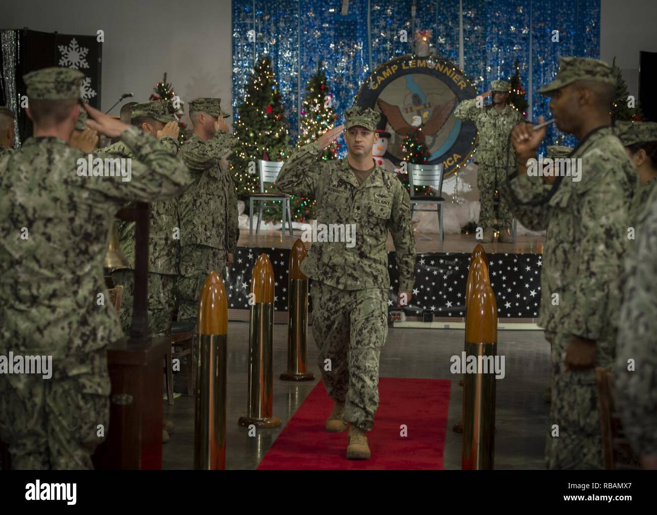 CAMP LEMONNIER, Djibouti - U.S. Navy Cdr. Eric T. McDermott (centered ...
