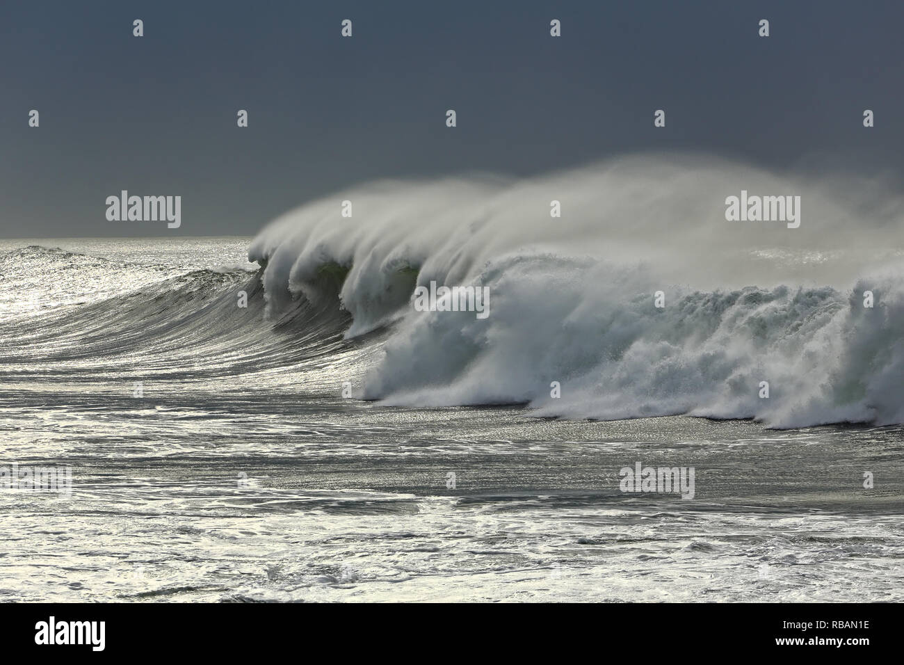 Beautiful big whit wave in a glistenin sea Stock Photo - Alamy