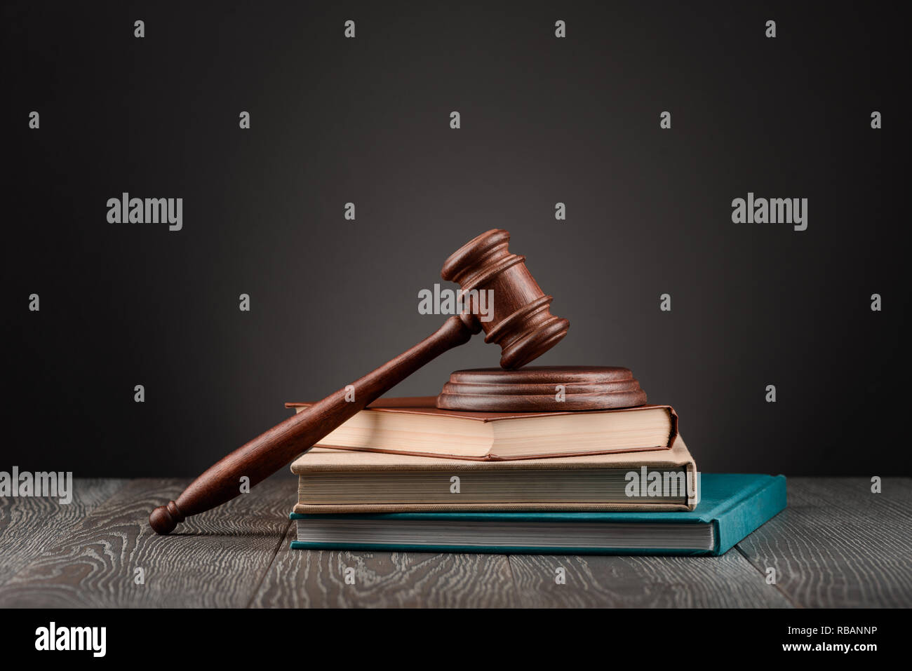 Gavel on top of books Stock Photo - Alamy